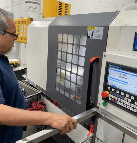 Monterrey man at machine - Fortis Mechanical Products Co